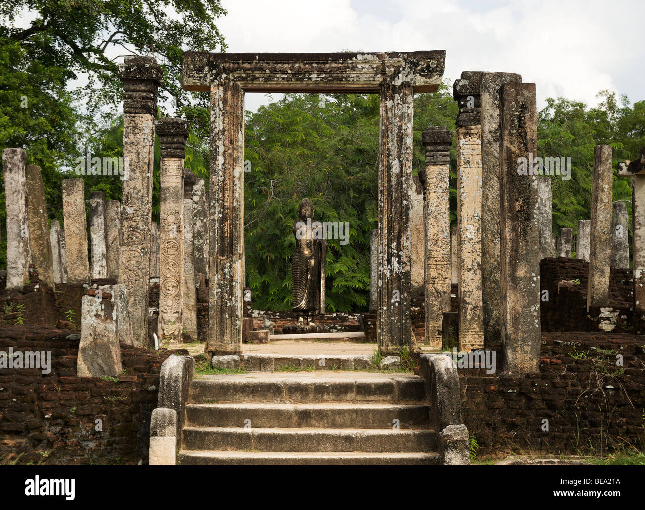 Standing Buddha statue and ancient ruins in Atadage Polonnaruwa Sri ...