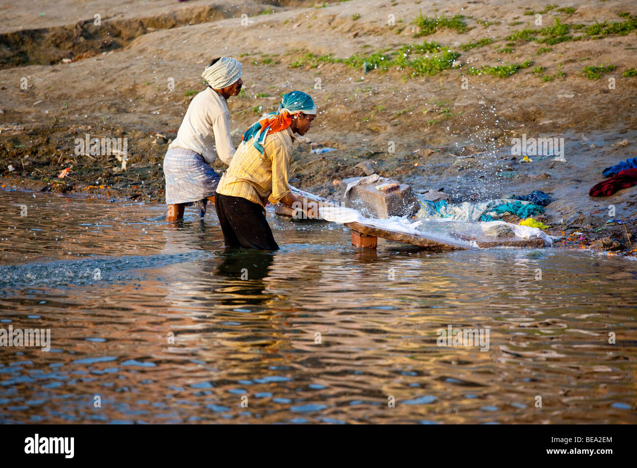 Dhobi Washing Clothes in the Ganges River in Varanasi India Stock Photo ...