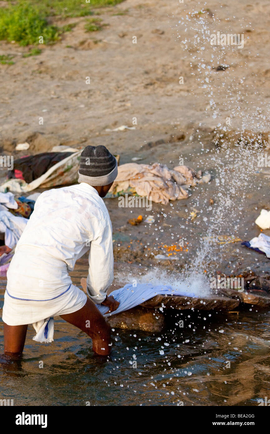 Dhobi Washing Clothes in the Ganges River in Varanasi India Stock Photo ...