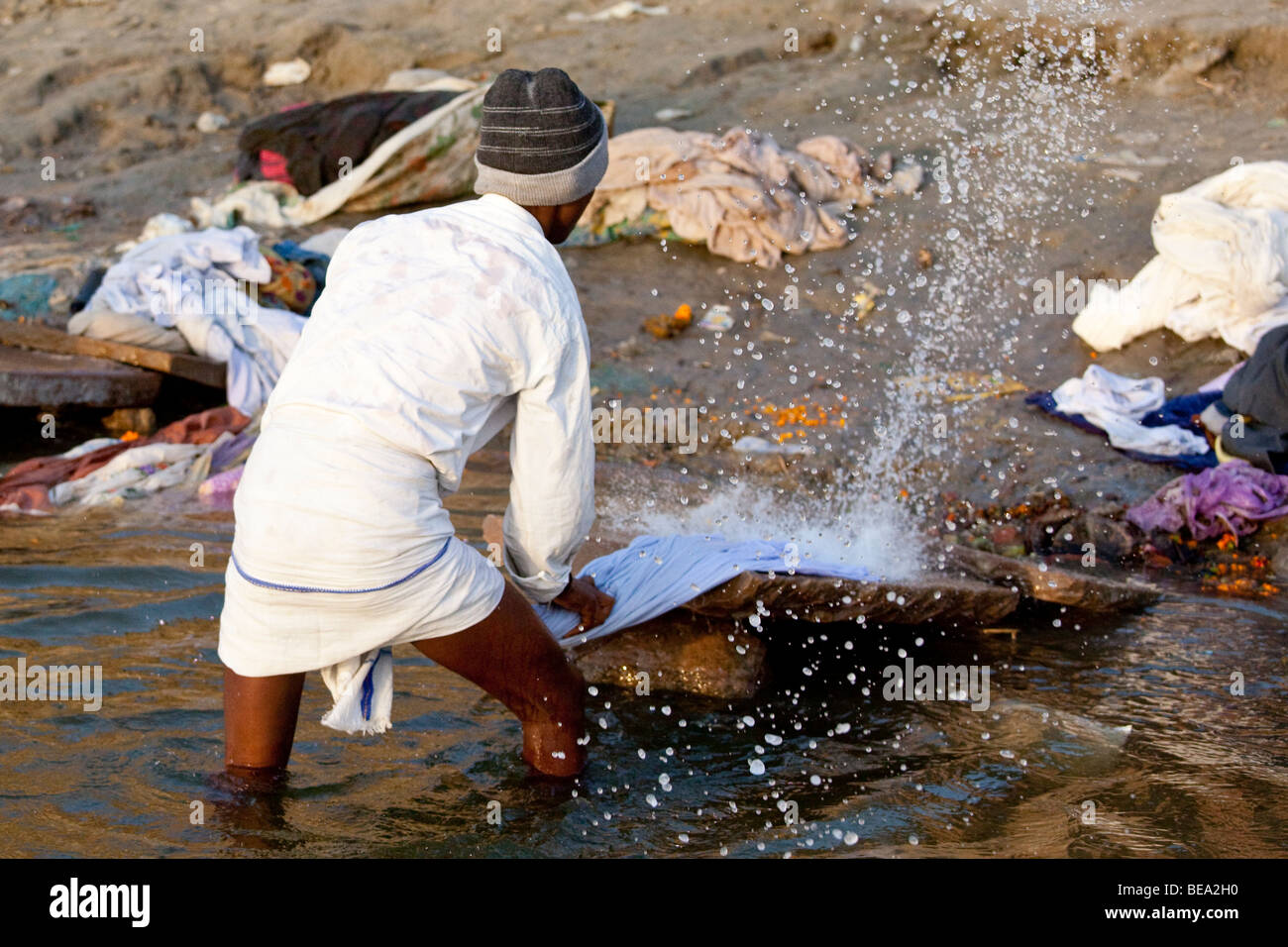 Dhobi Washing Clothes in the Ganges River in Varanasi India Stock Photo ...