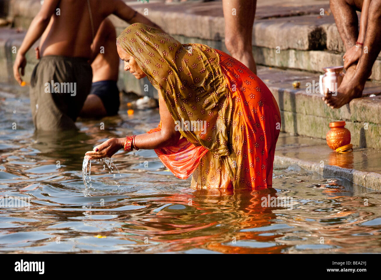 Woman Praying in the Ganges River in Varanasi India Stock Photo - Alamy