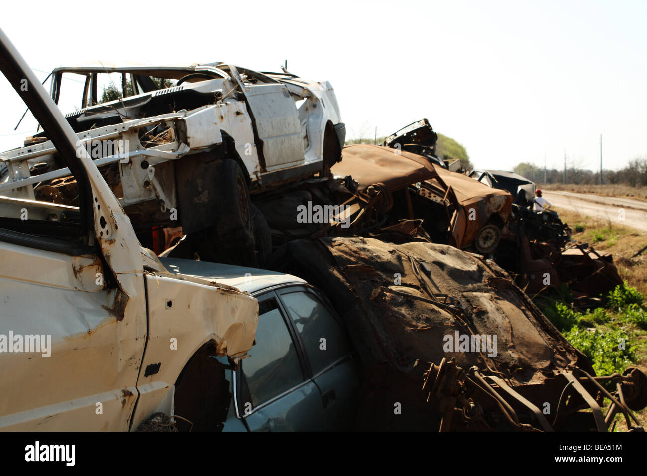 Dismantled and broken cars in a lot Stock Photo - Alamy