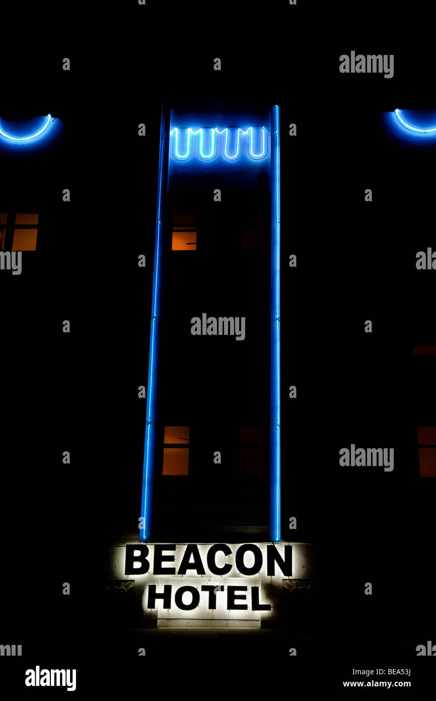 The Beacon Hotel lit up at night in neon. South Beach Art Deco District ...