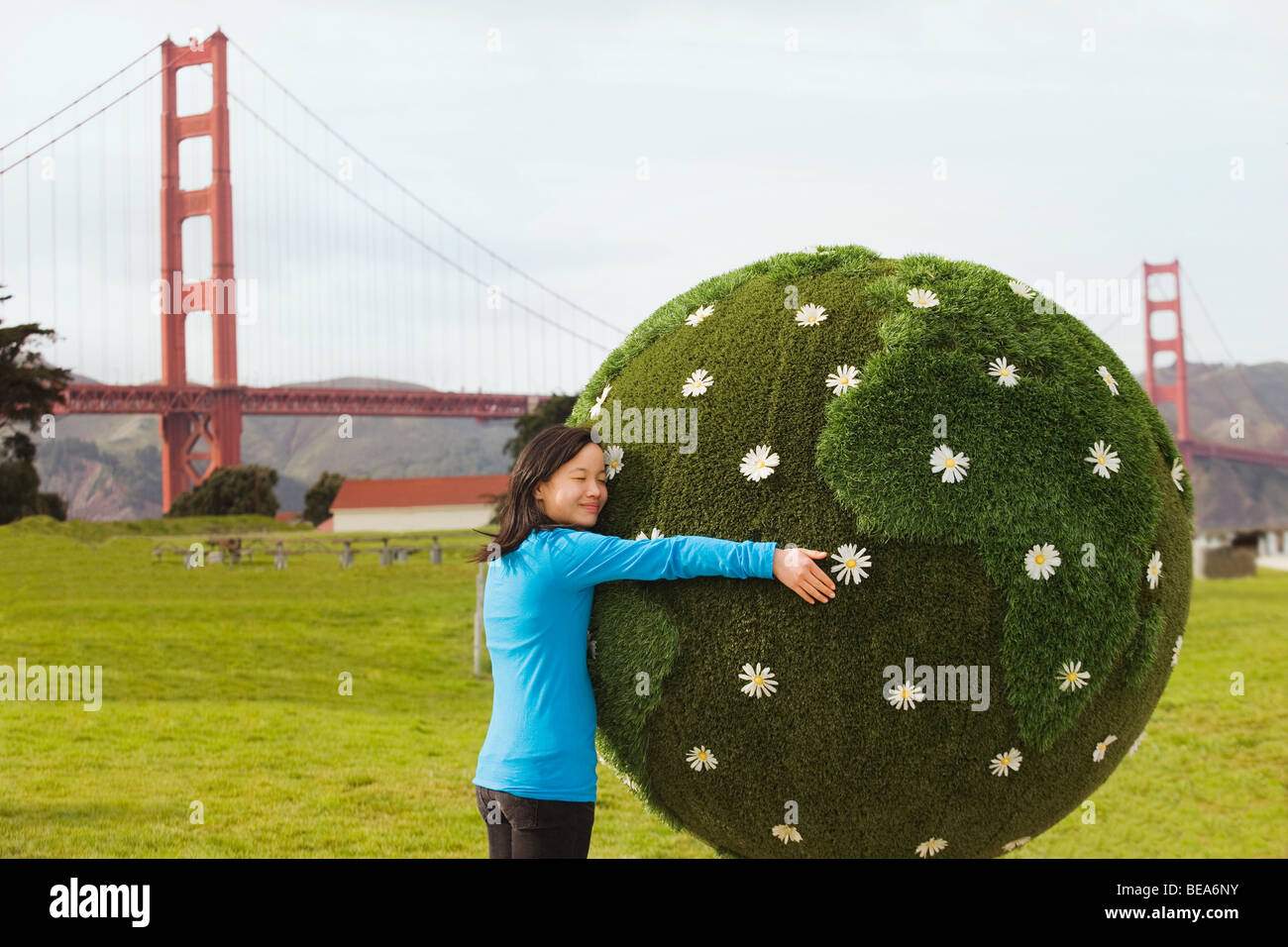 People hugging the earth hi-res stock photography and images - Alamy