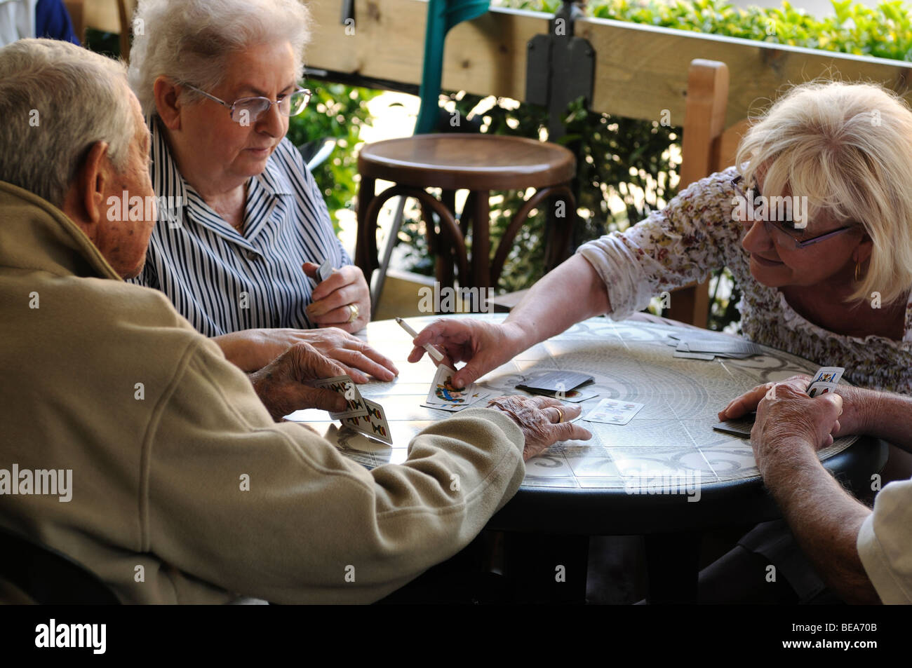 People playing cards in a bar in Italy Stock Photo - Alamy