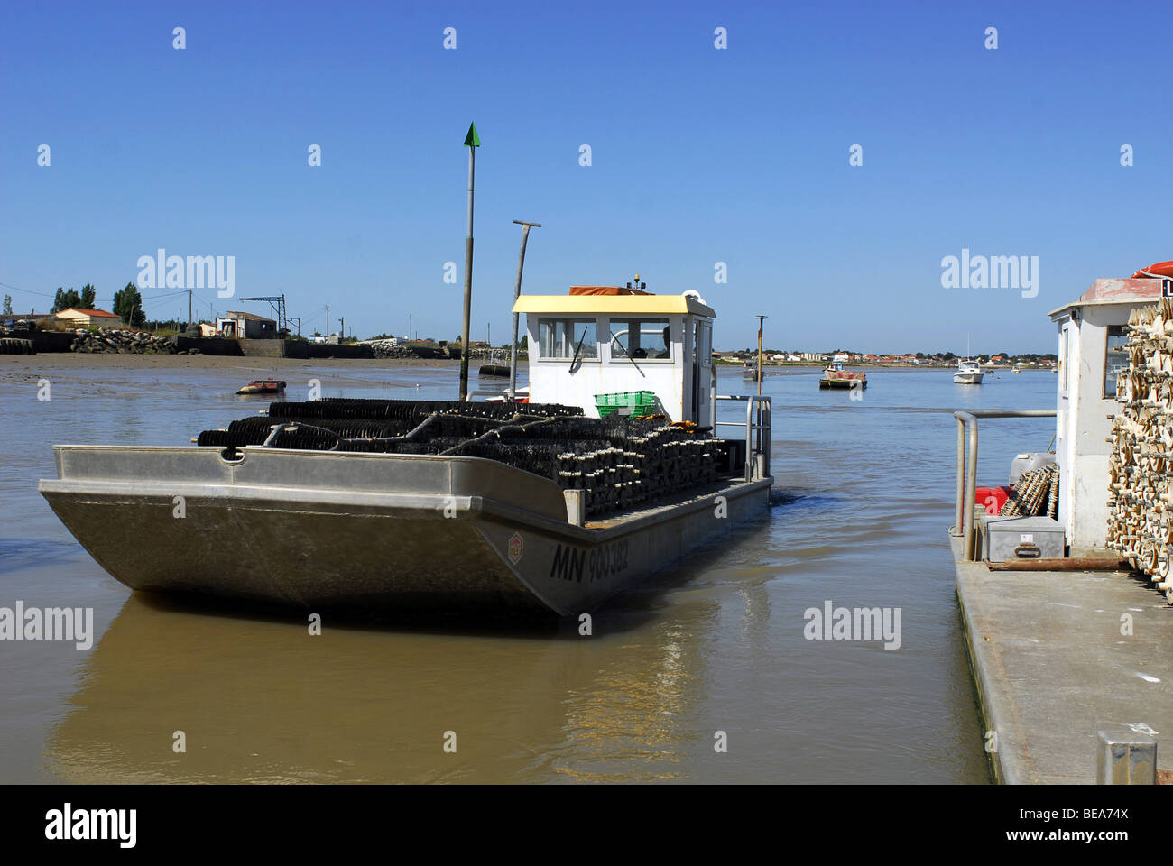 Oyster farming: oyster barge Stock Photo - Alamy