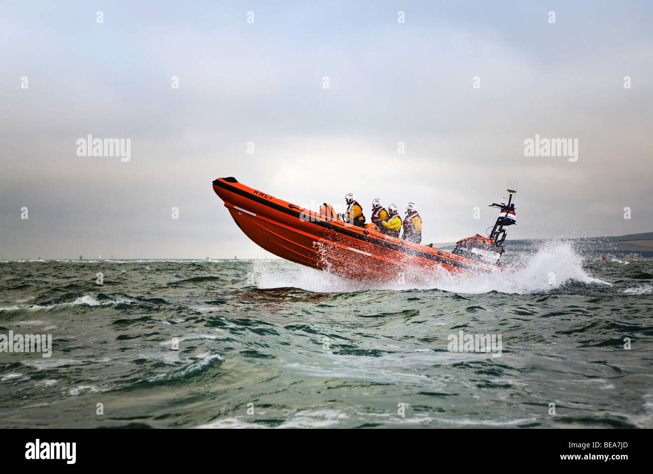 RNLI rescue boat and crew in action off the Dorset coast. UK Stock ...