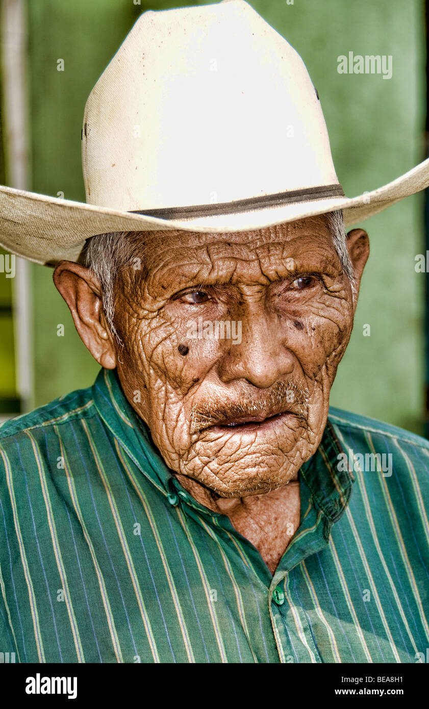Local humble poor man portrait with cowboy hat in Lake Atitlan village ...