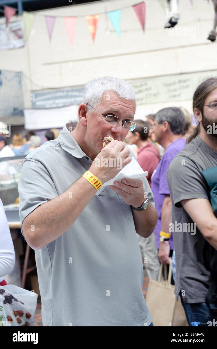 Scoffing food hi-res stock photography and images - Alamy