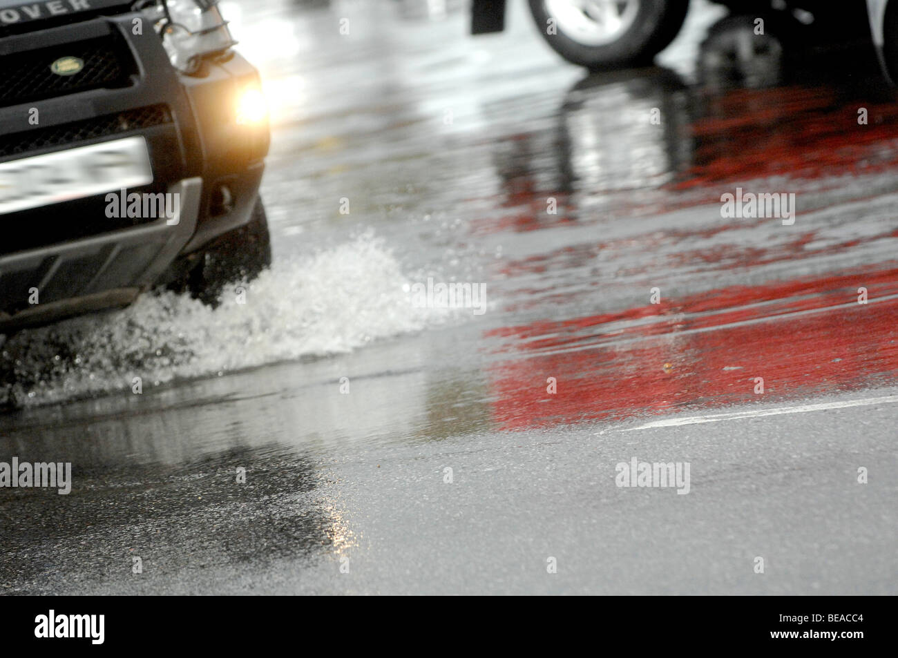 car driving through water Stock Photo - Alamy