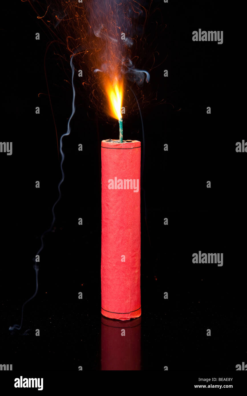A lit firecracker Stock Photo - Alamy