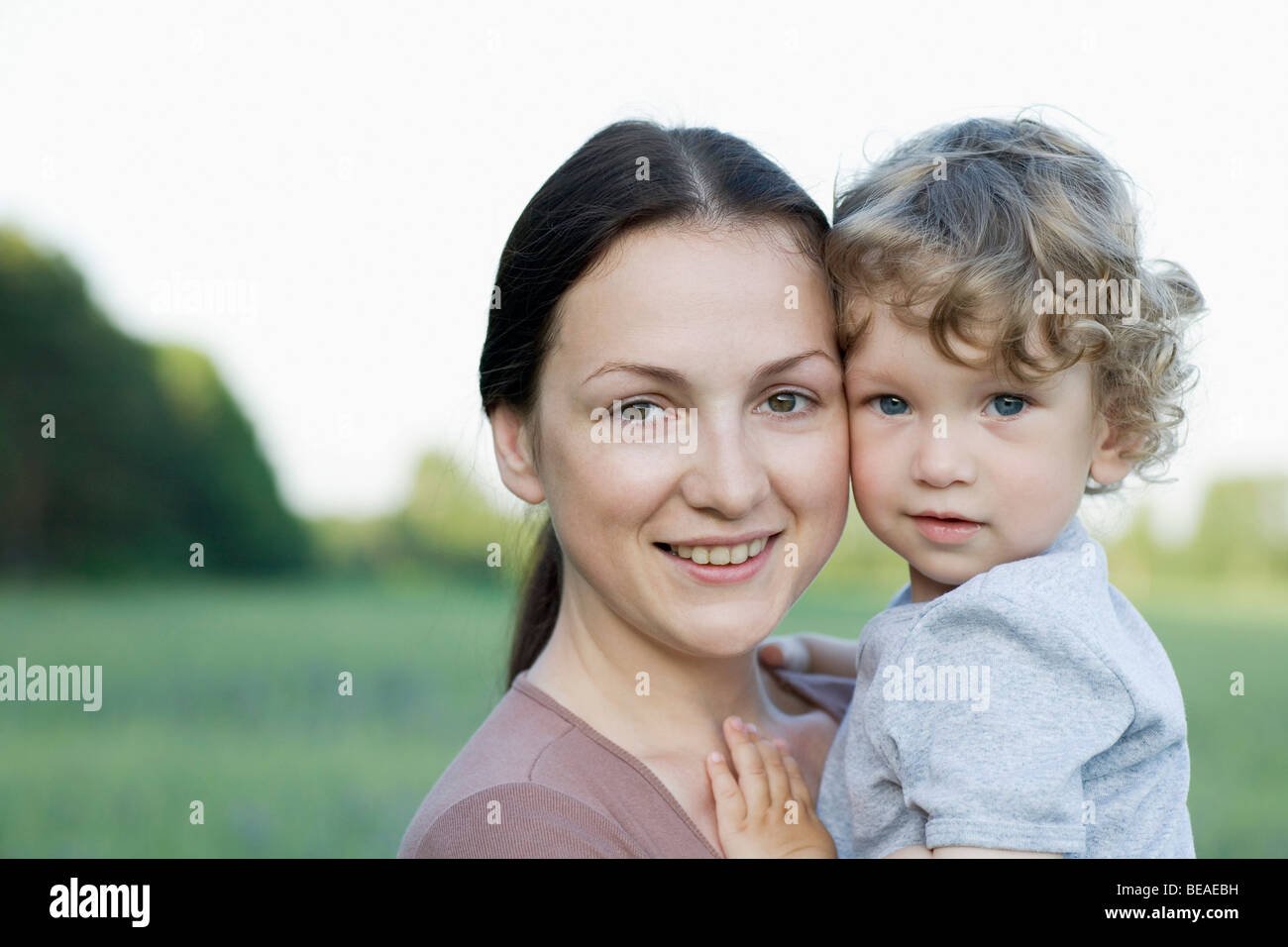 Portrait of a woman and a young boy Stock Photo - Alamy