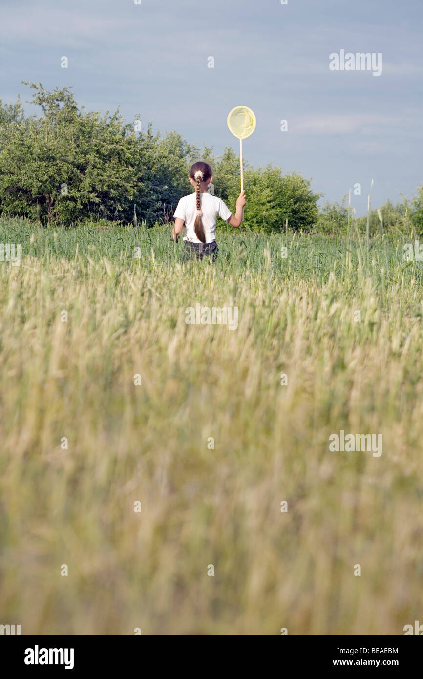 Girls catching butterflies butterfly hi-res stock photography and ...