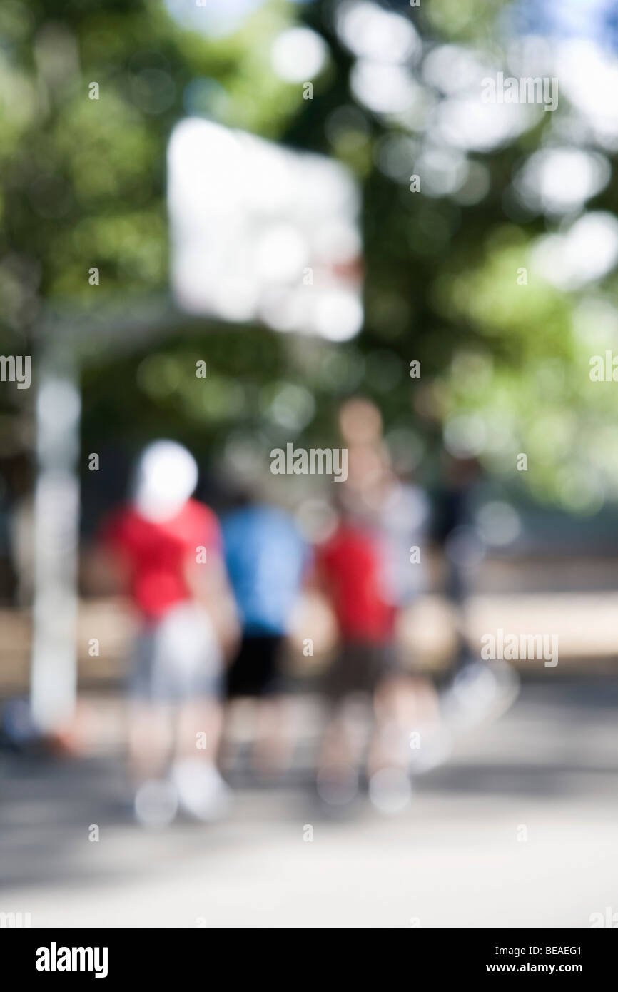 People playing basketball, outdoors, defocused Stock Photo - Alamy