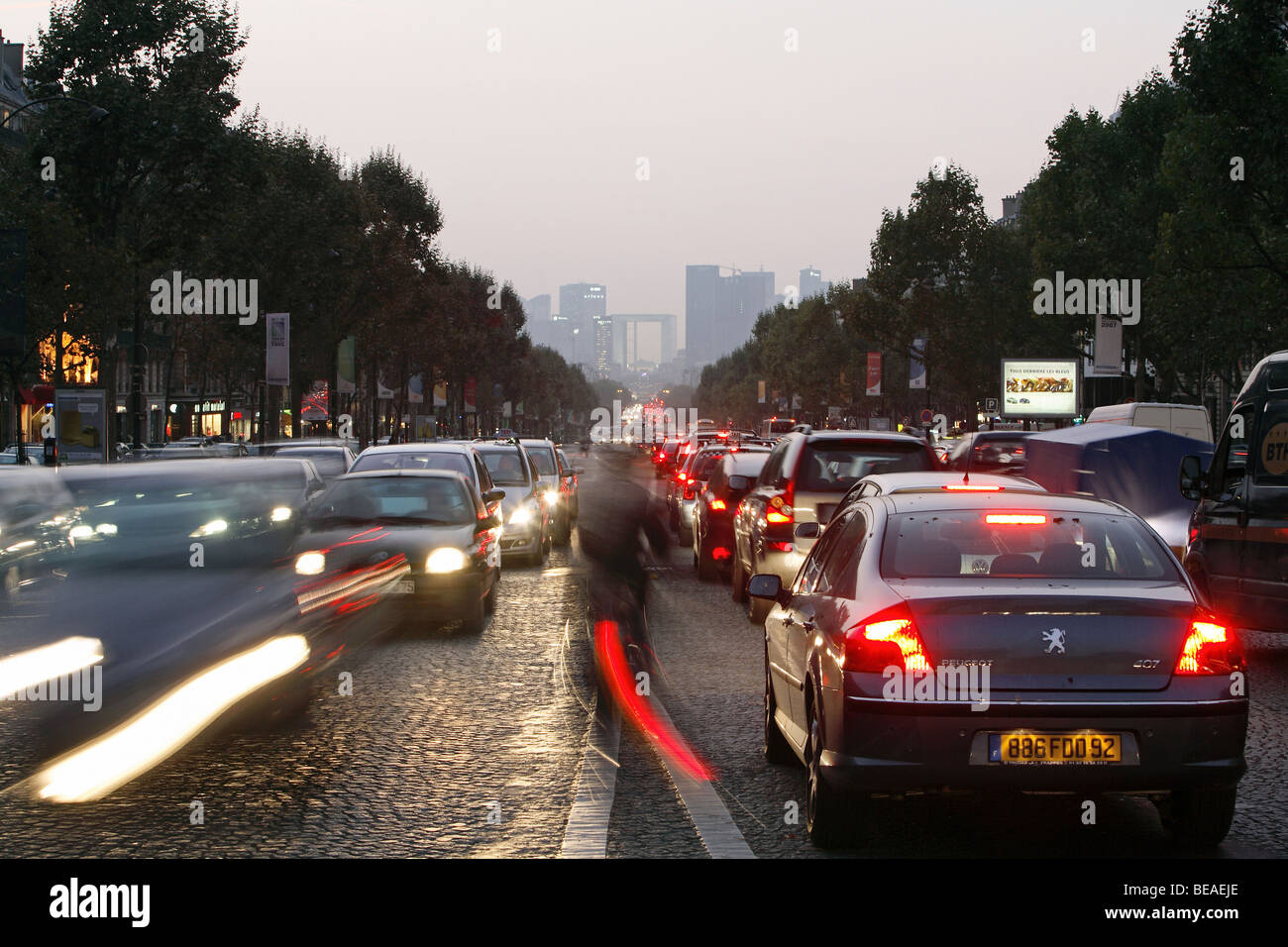 Rush hour on the Avenue des Champs Elysees, Paris, France Stock Photo ...