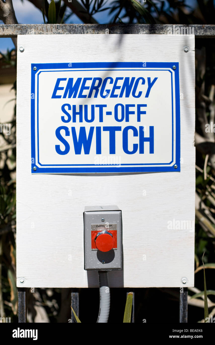 An EMERGENCY SHUT-OFF SWITCH sign and button Stock Photo - Alamy