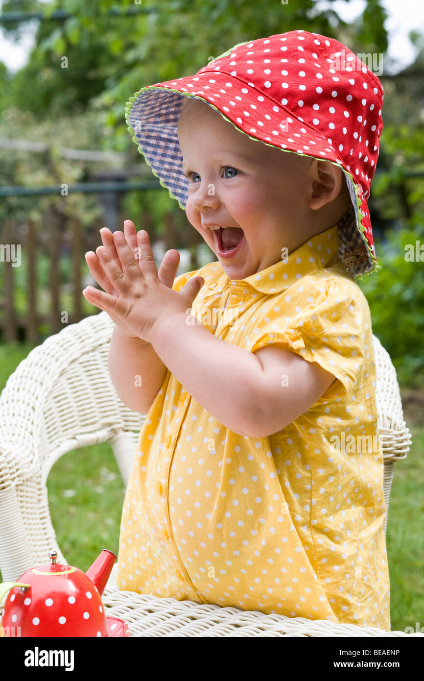 Portrait of a toddler clapping, close-up Stock Photo - Alamy