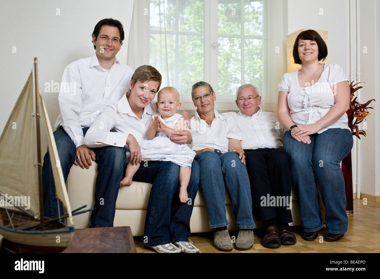 Formal portrait of a multi-generation family Stock Photo - Alamy