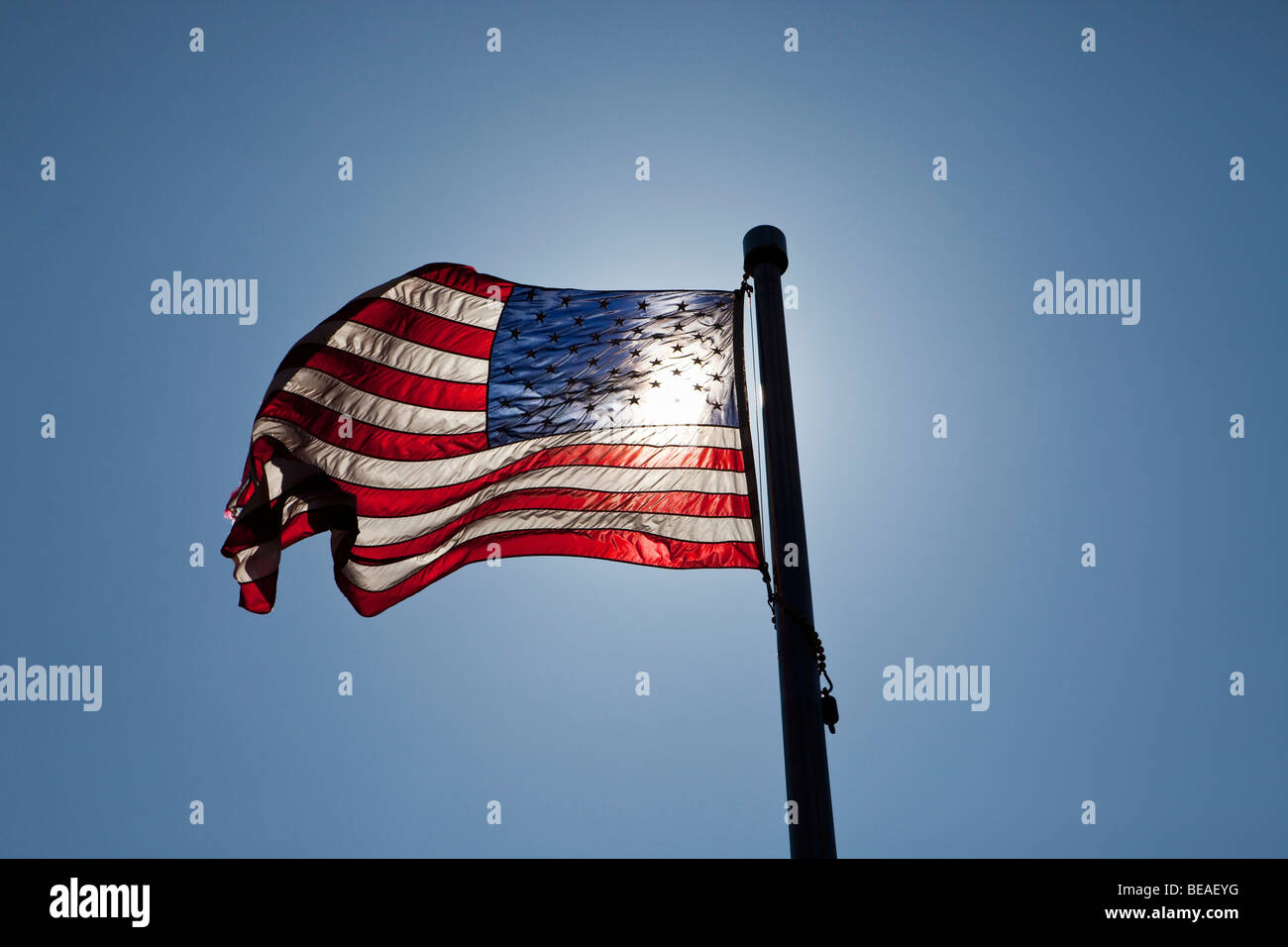 American flag flying Stock Photo - Alamy