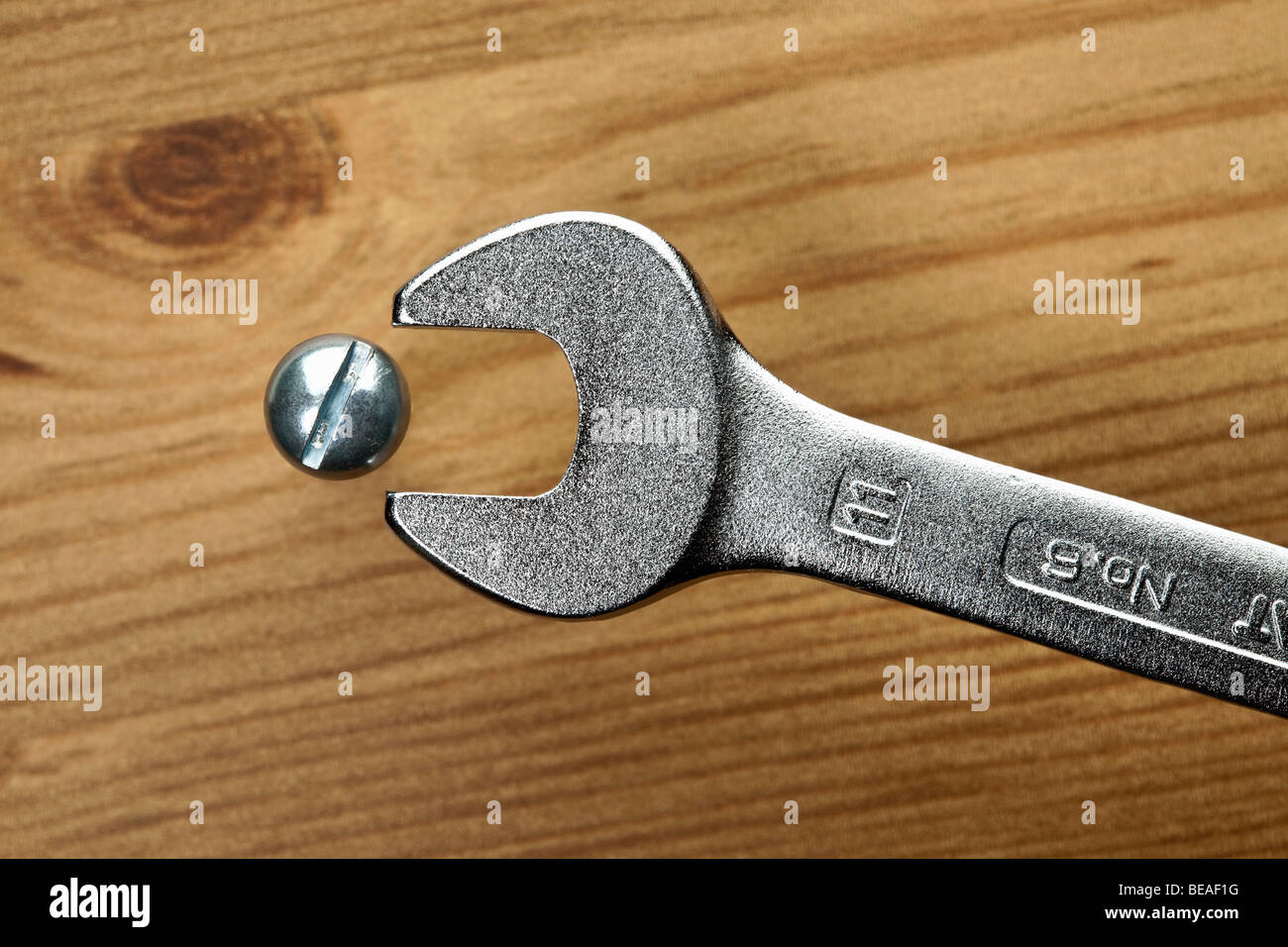 A spanner and screw Stock Photo - Alamy