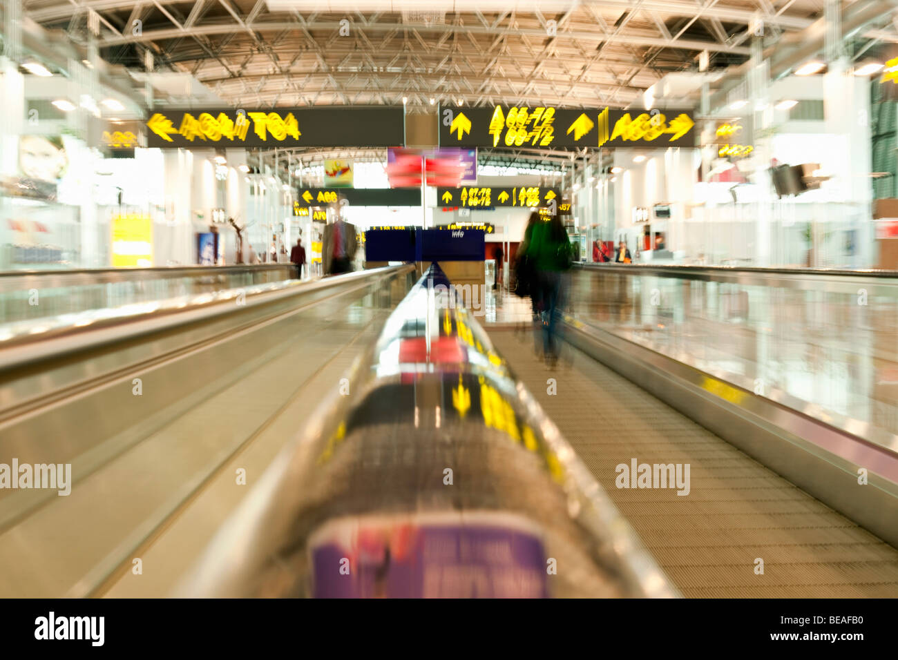 A moving walkway in an airport Stock Photo - Alamy