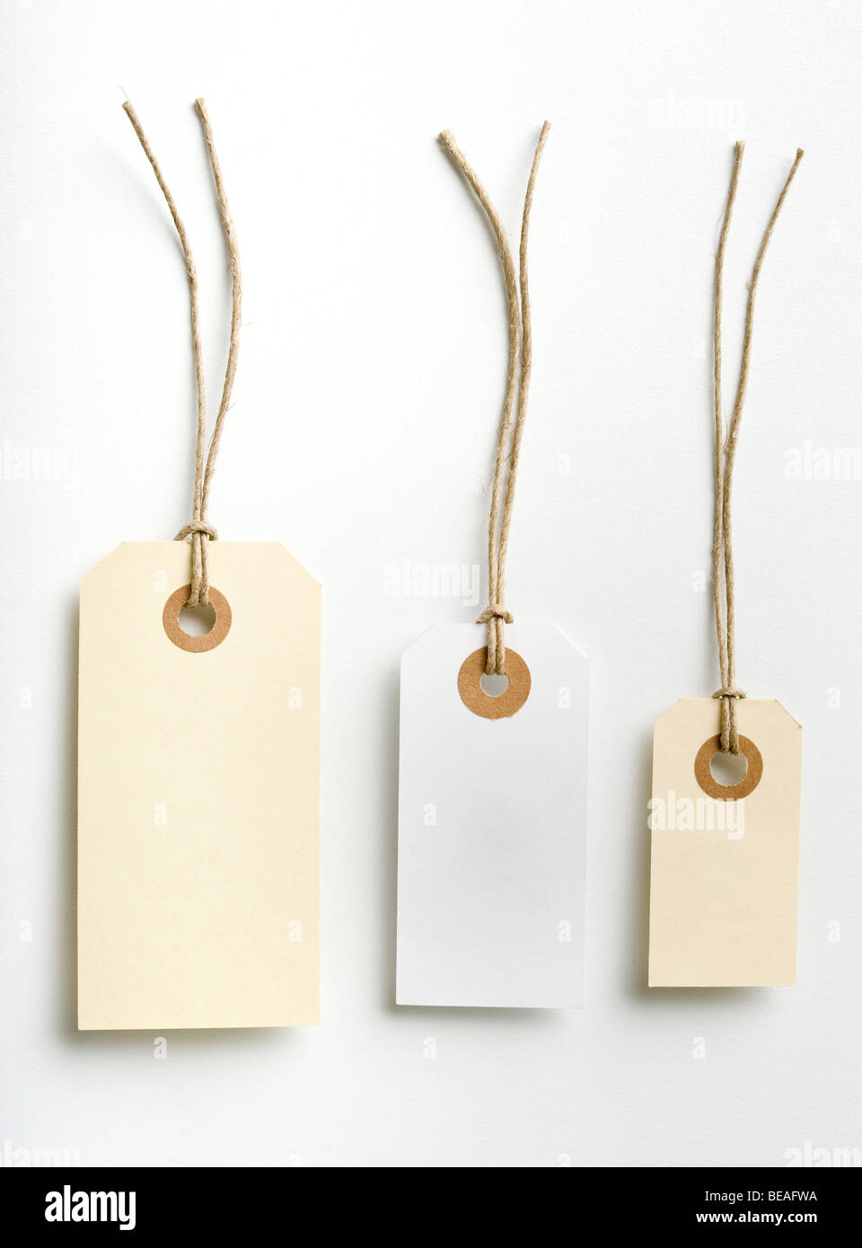 Three labels with simple rope isolated on white Stock Photo - Alamy