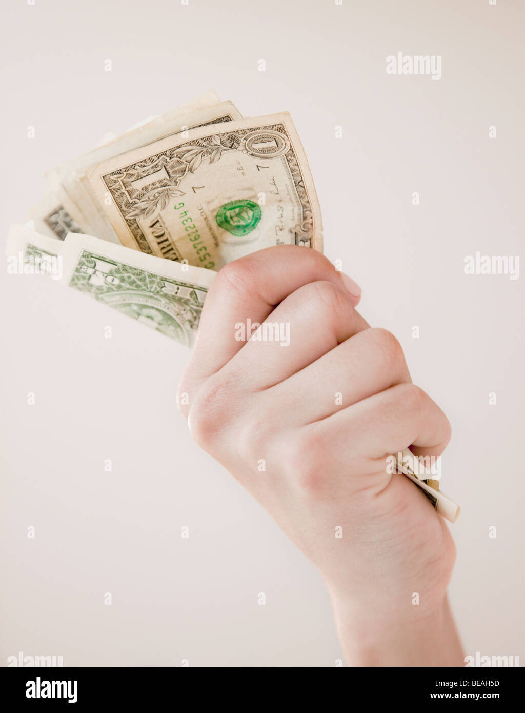 Hand Clutching Money High Resolution Stock Photography and Images - Alamy