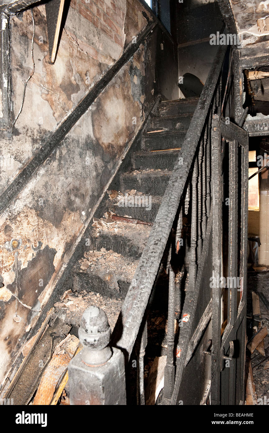 Burnt out house following serious house fire showing extensive damage ...
