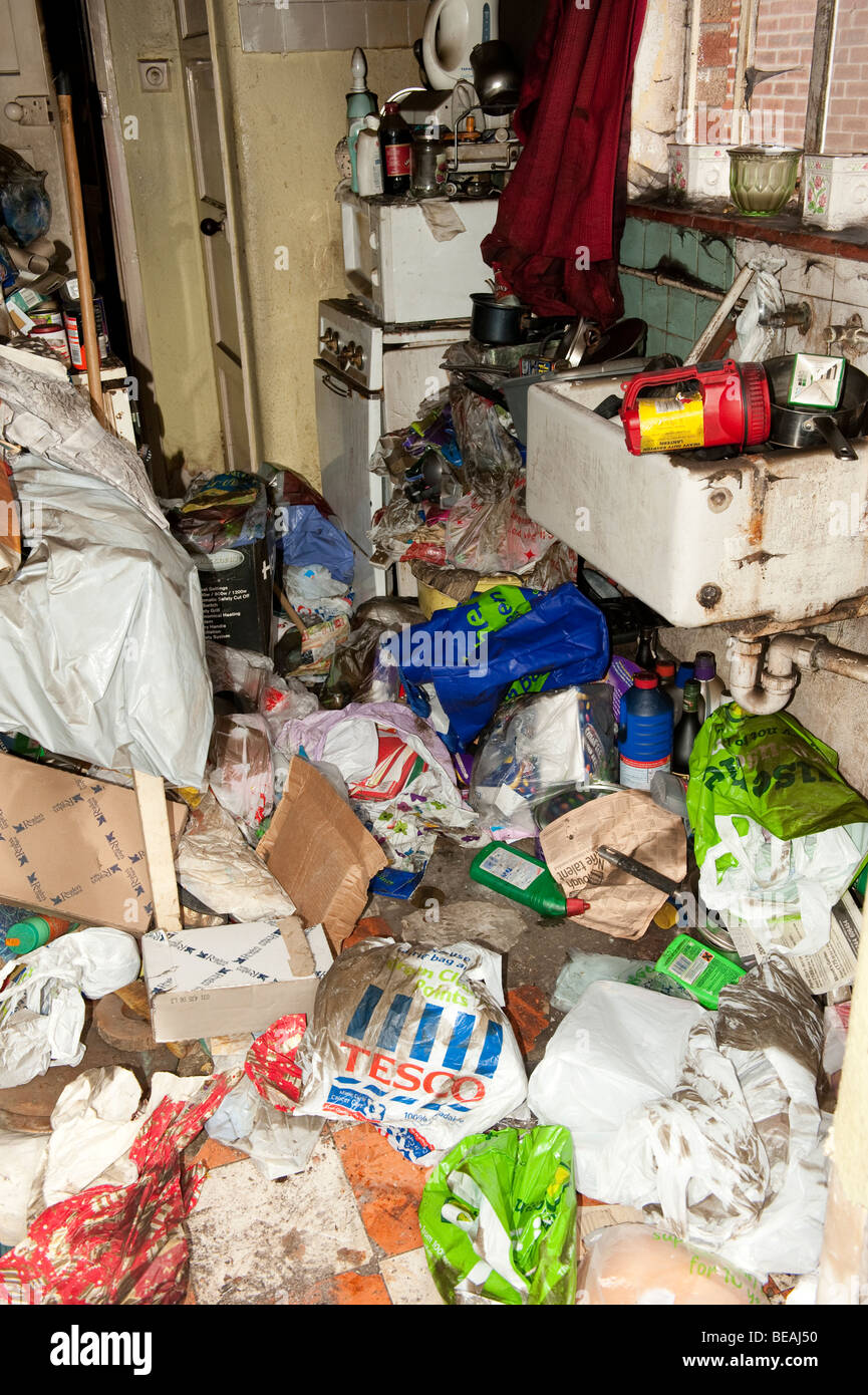 Kitchen full of rubbish stored by elderly person who lived there Stock ...