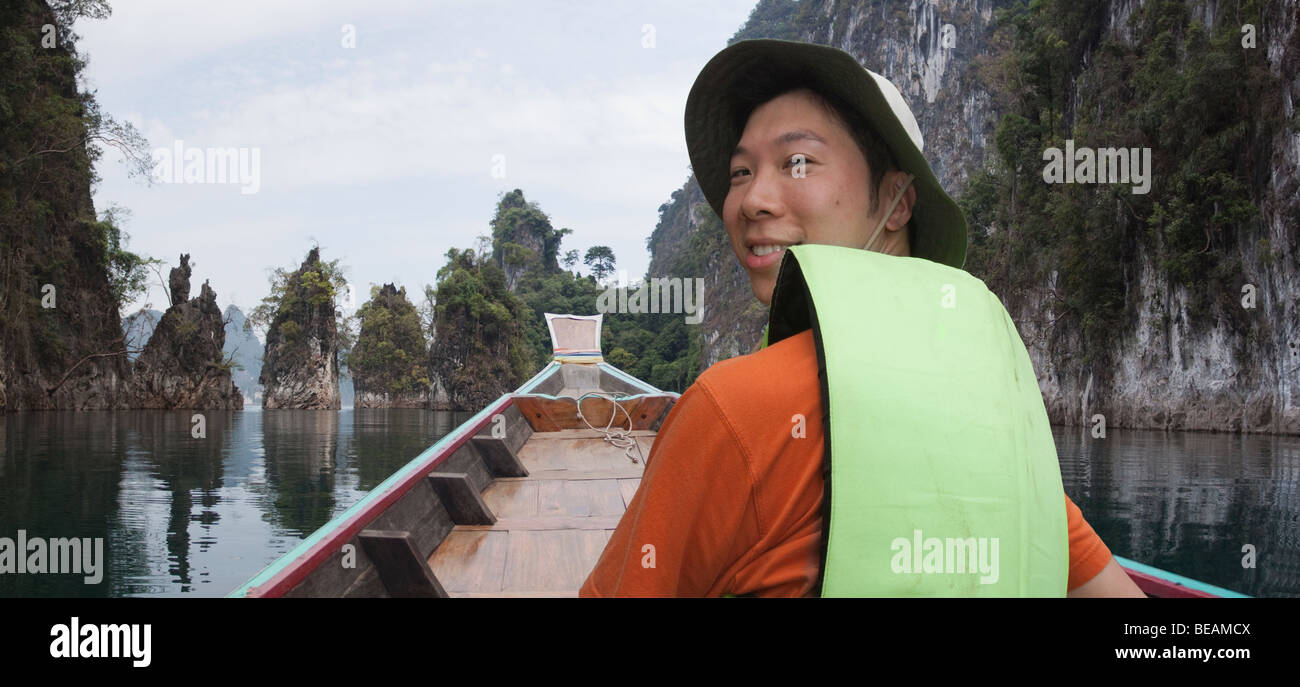 Asian man in boat Stock Photo - Alamy