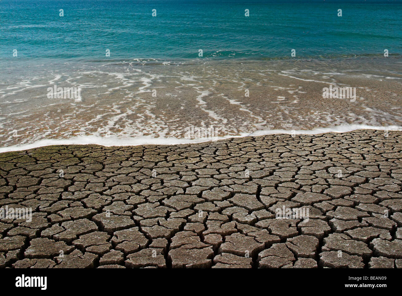 Water and desert mixed in PS Stock Photo - Alamy