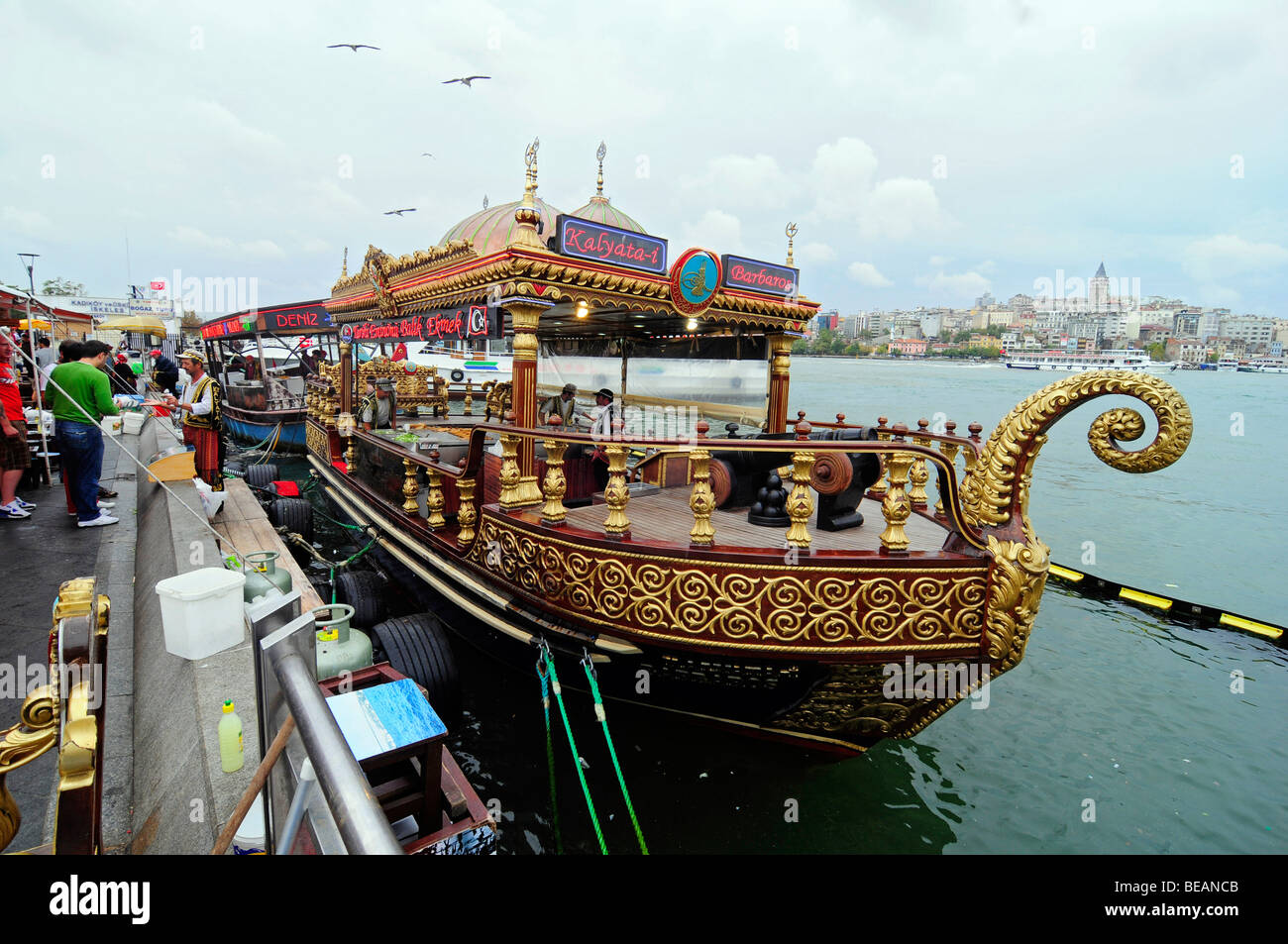 Traditional boat selling fish sandwiches (balik) in the Golden Horn, a ...