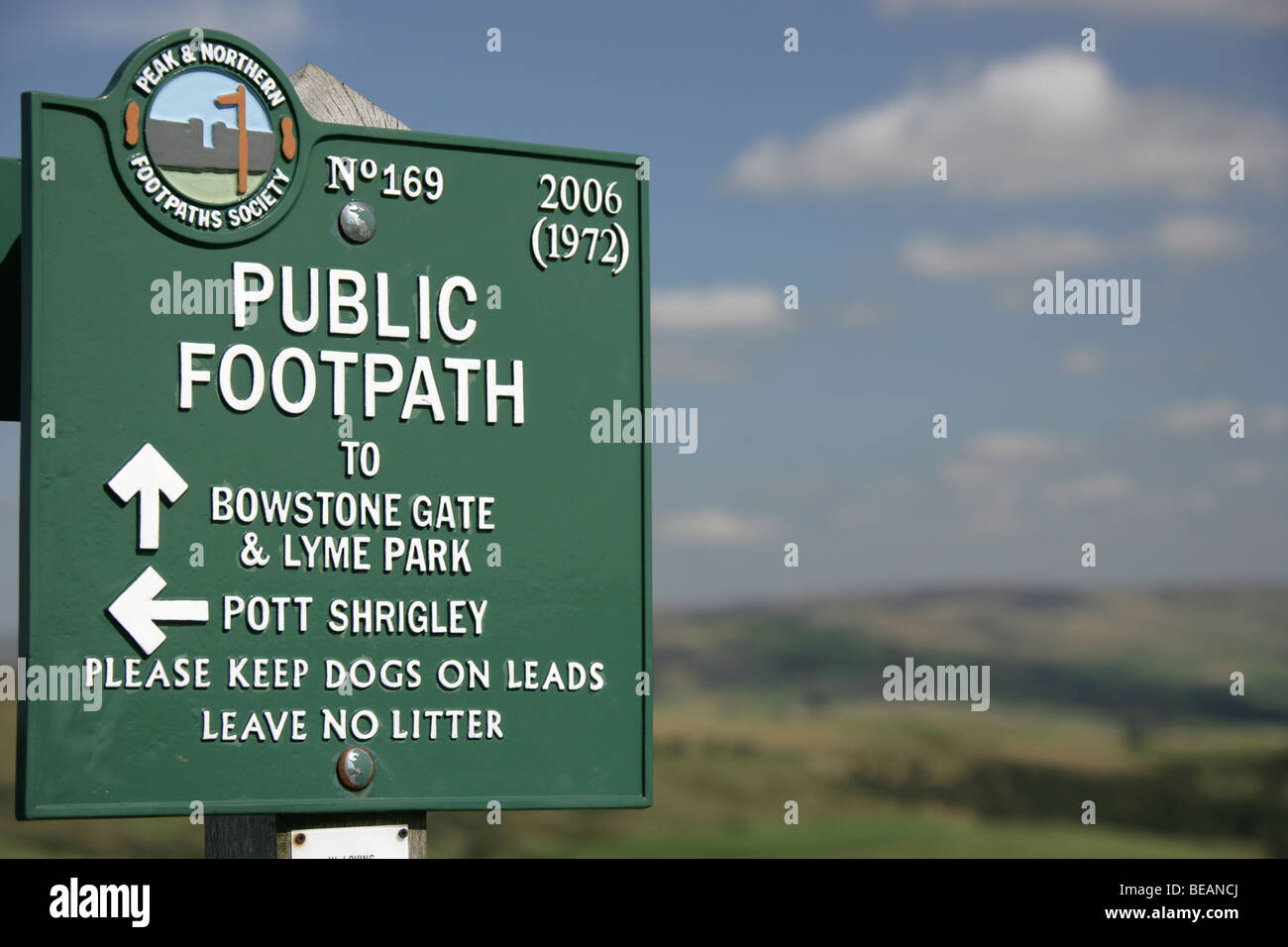 Close up view of a public footpath direction sign on the Gritstone ...