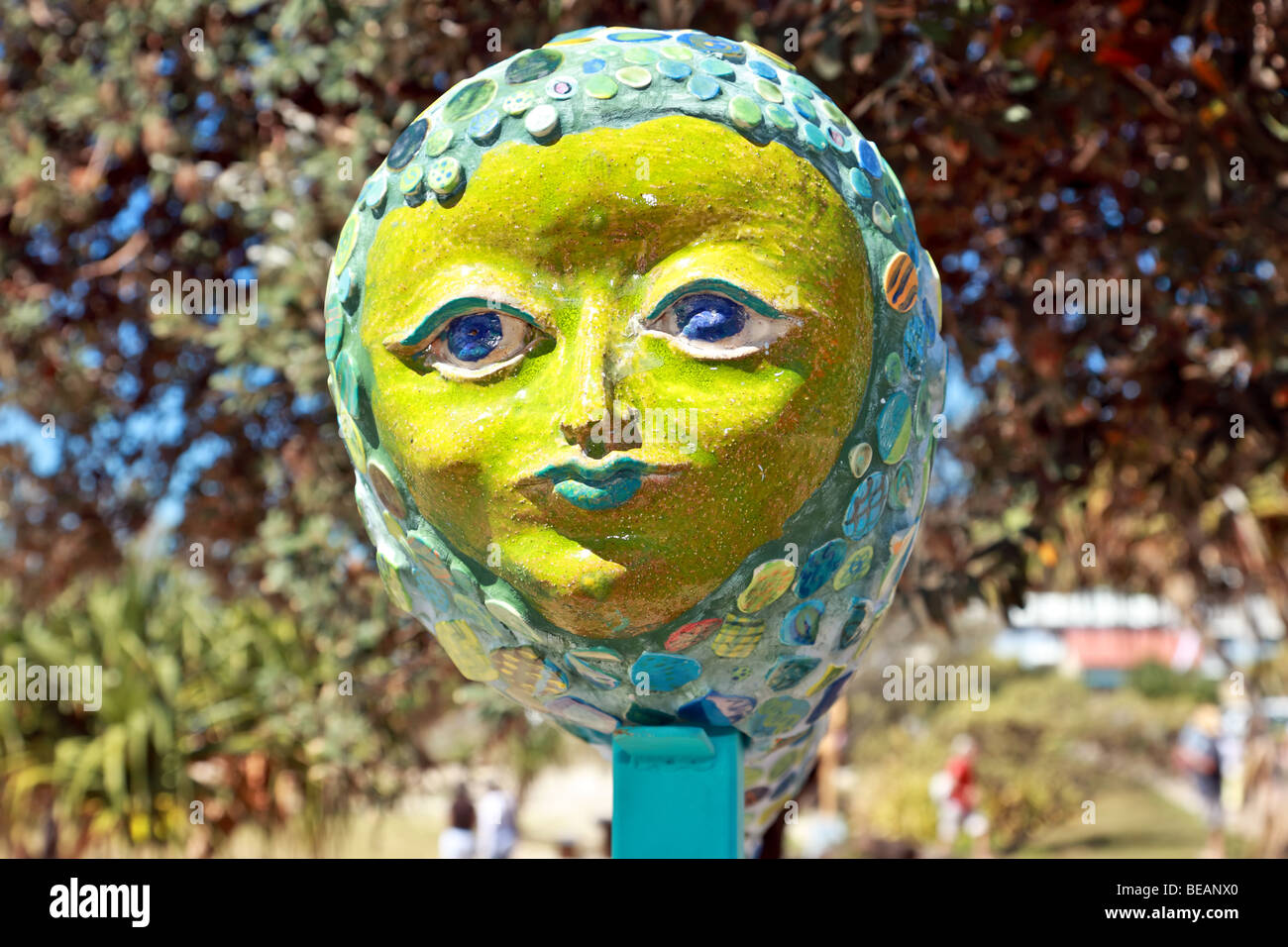Fish and face Sculpture on display by the ocean at an arts festival ...