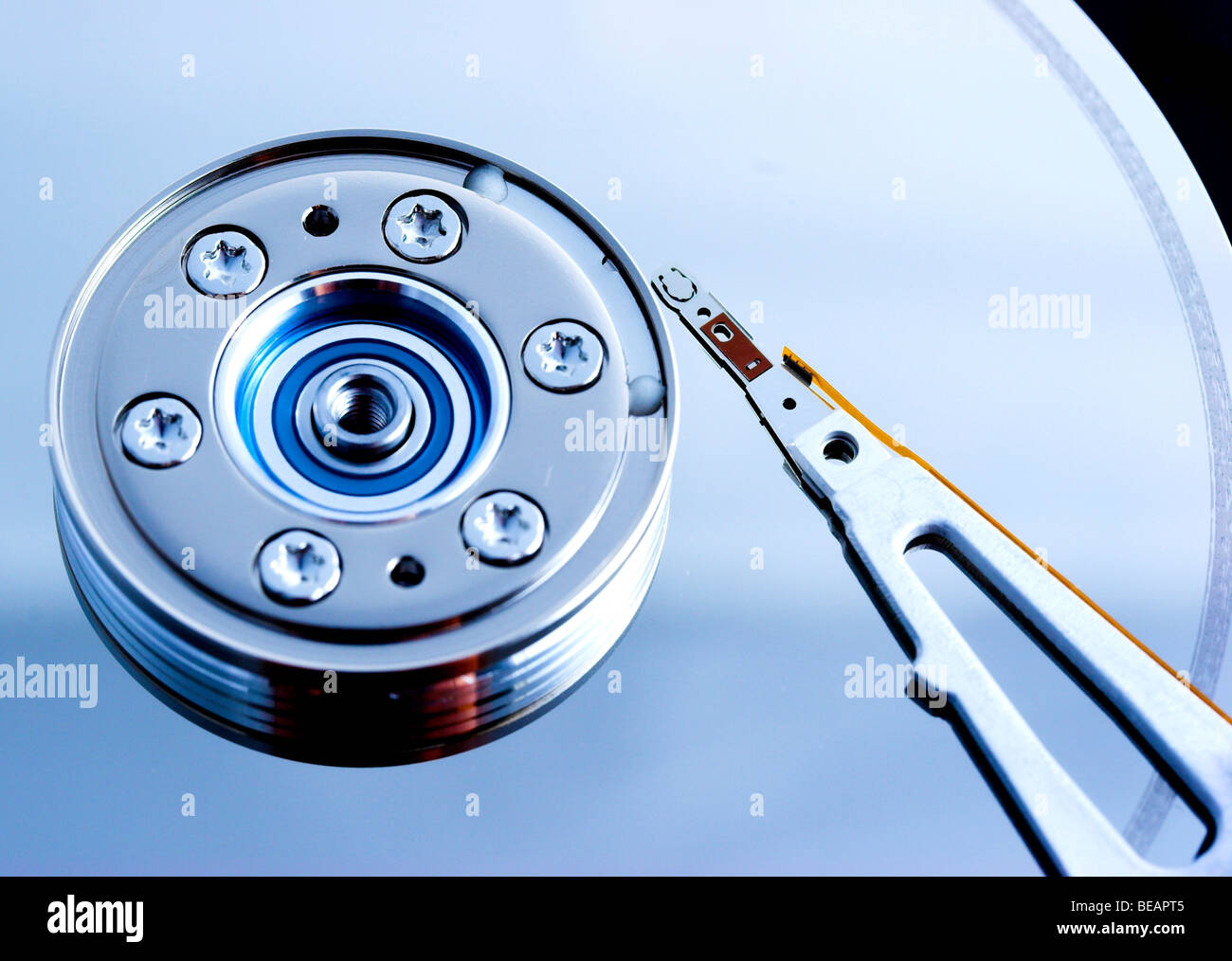 Open hard disk drive - shallow depth of field with focus on the needle ...