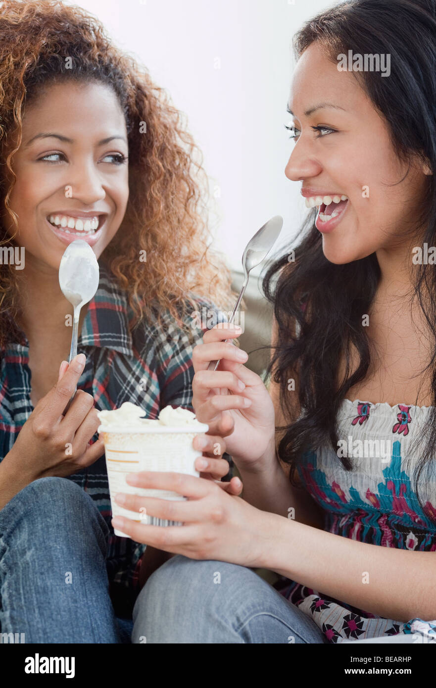 Women eating ice cream Stock Photo - Alamy