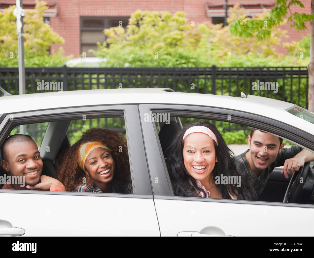 Friends riding in car Stock Photo - Alamy