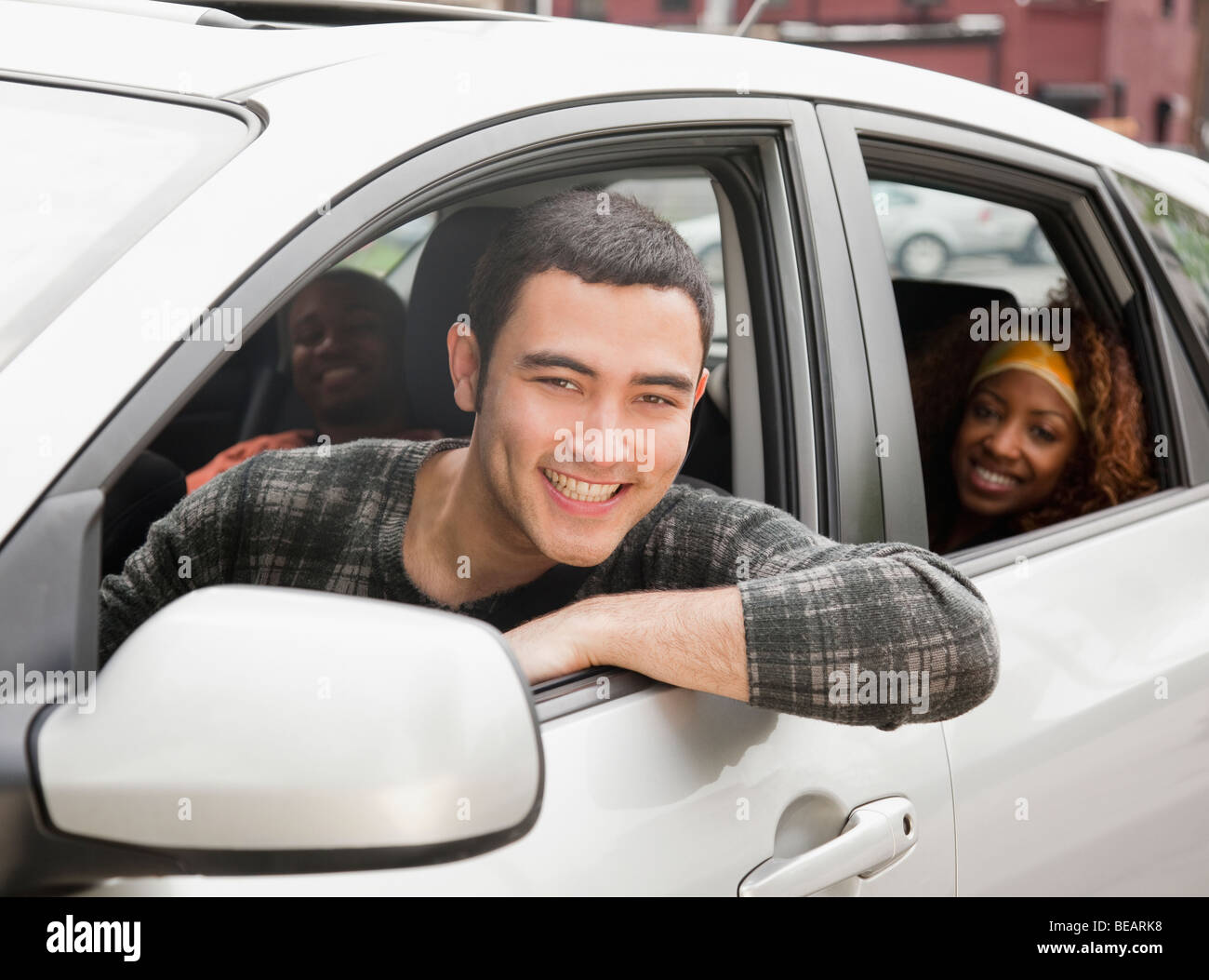 Friends riding in car Stock Photo - Alamy