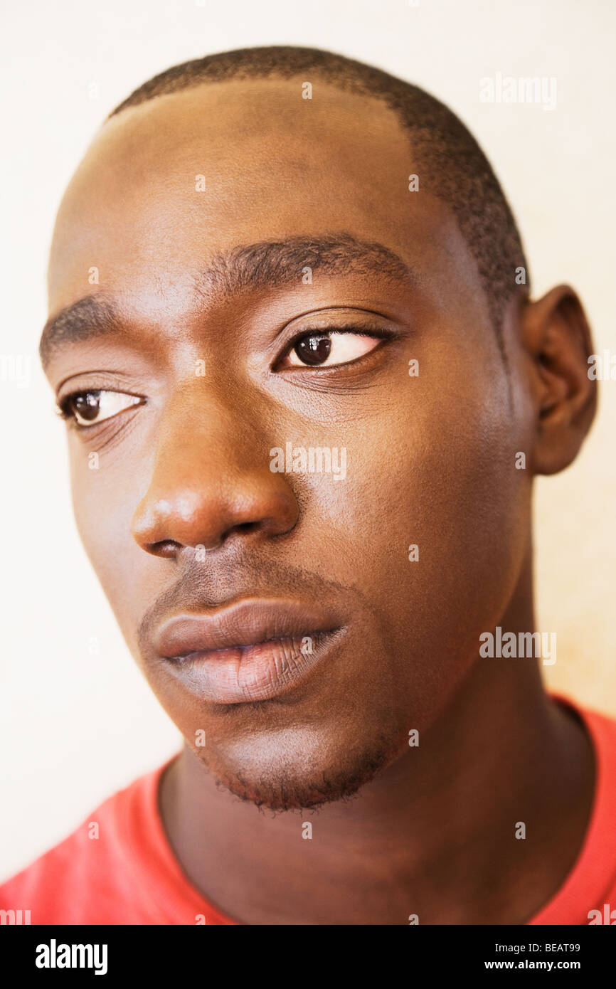 Close up of serious African man Stock Photo - Alamy