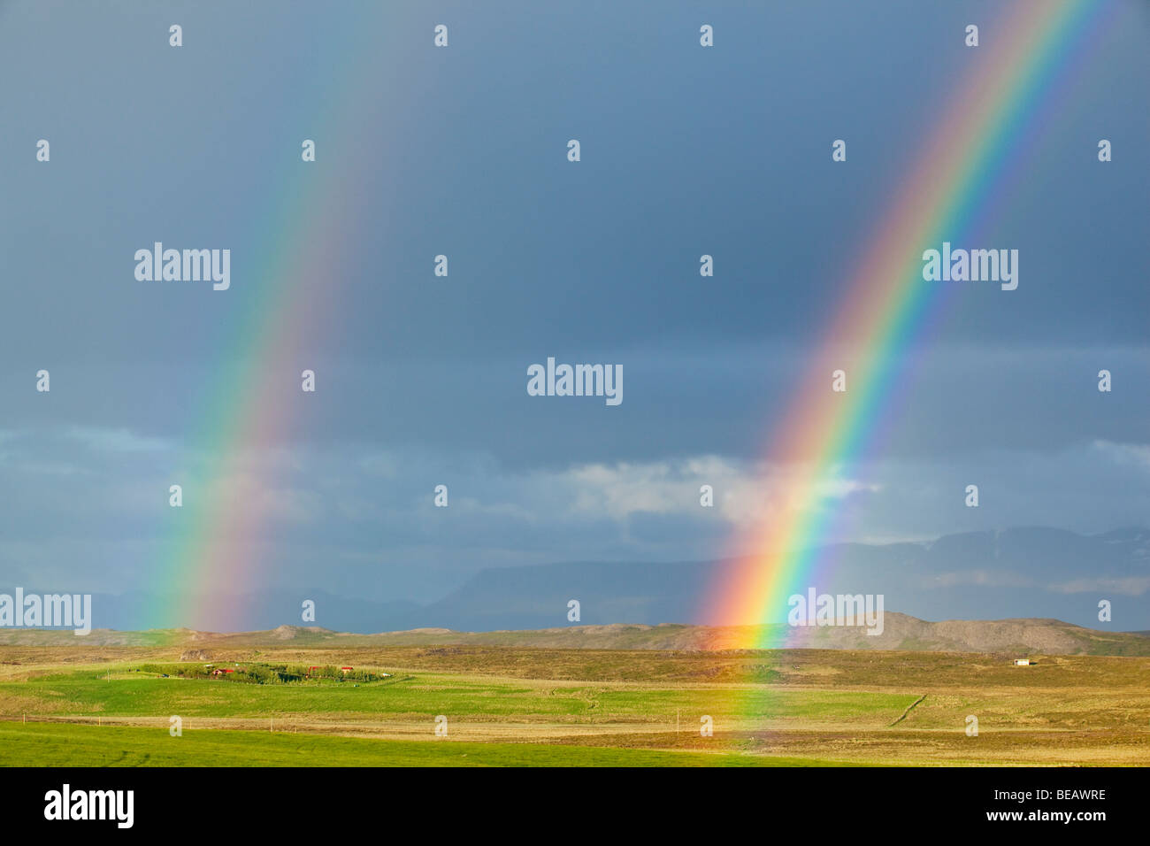 Double rainbow over farm fields, Iceland Stock Photo - Alamy