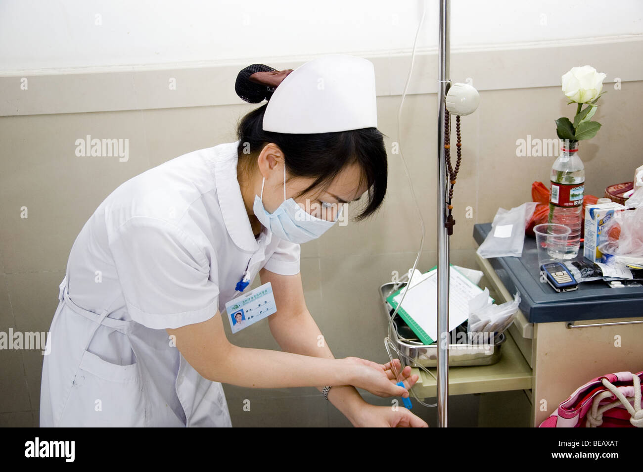 Young, kind and hard working nurse in Shenzhen orthopedical hospital ...
