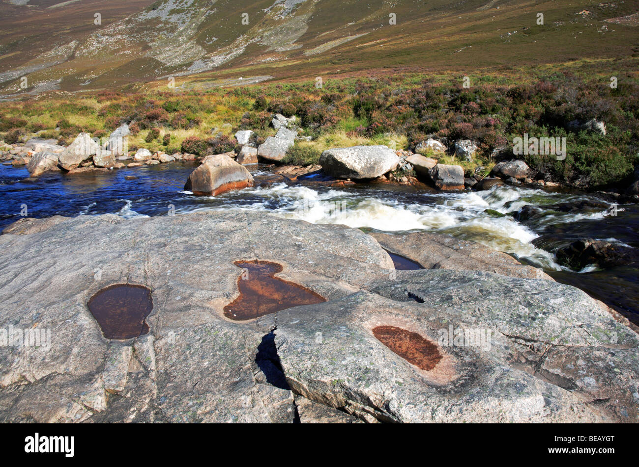 Granite outcrop in Callater Burn, near Braemar, Aberdeenshire, United ...