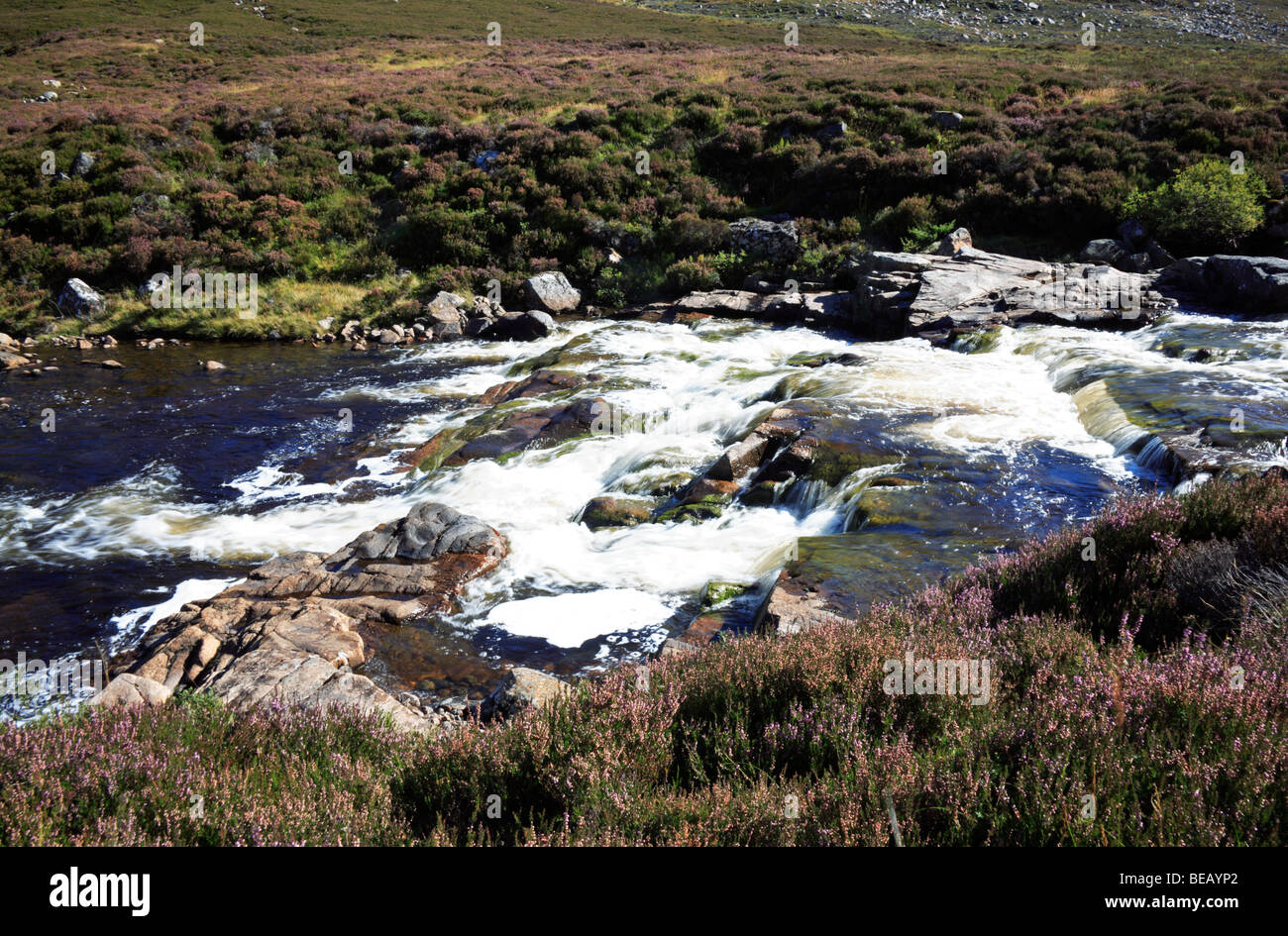 Small falls over rocks in the fast flowing Callater Burn, near Braemar ...