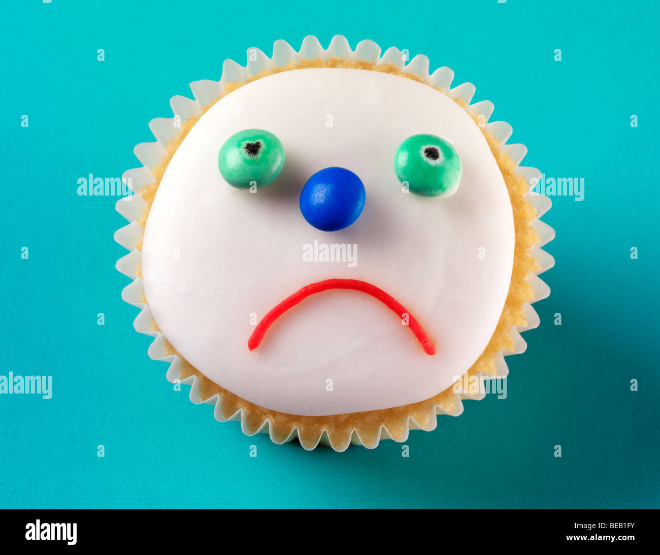 UNHAPPY FACE CUPCAKE Stock Photo - Alamy
