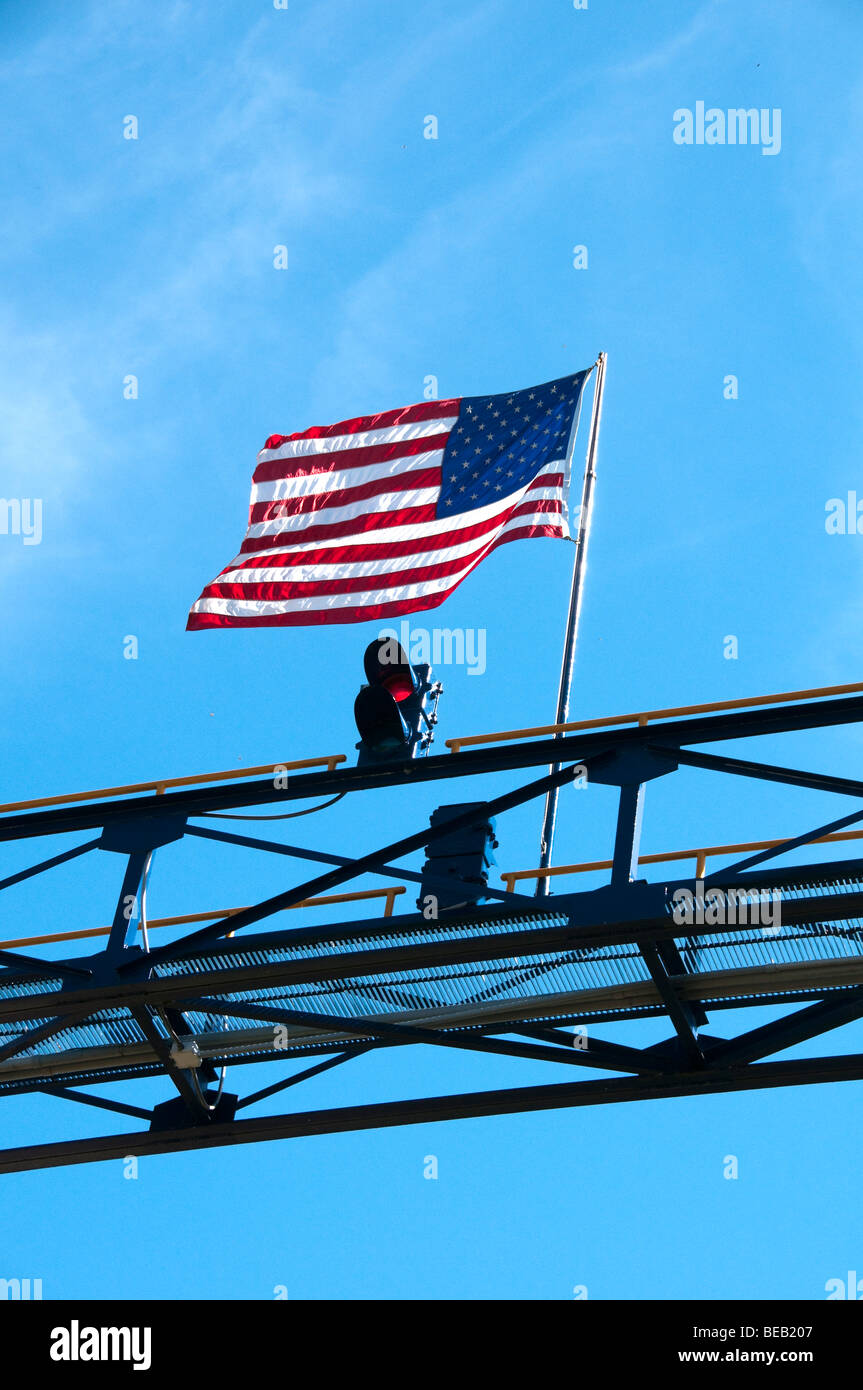 American flag blowing in the wind Stock Photo - Alamy
