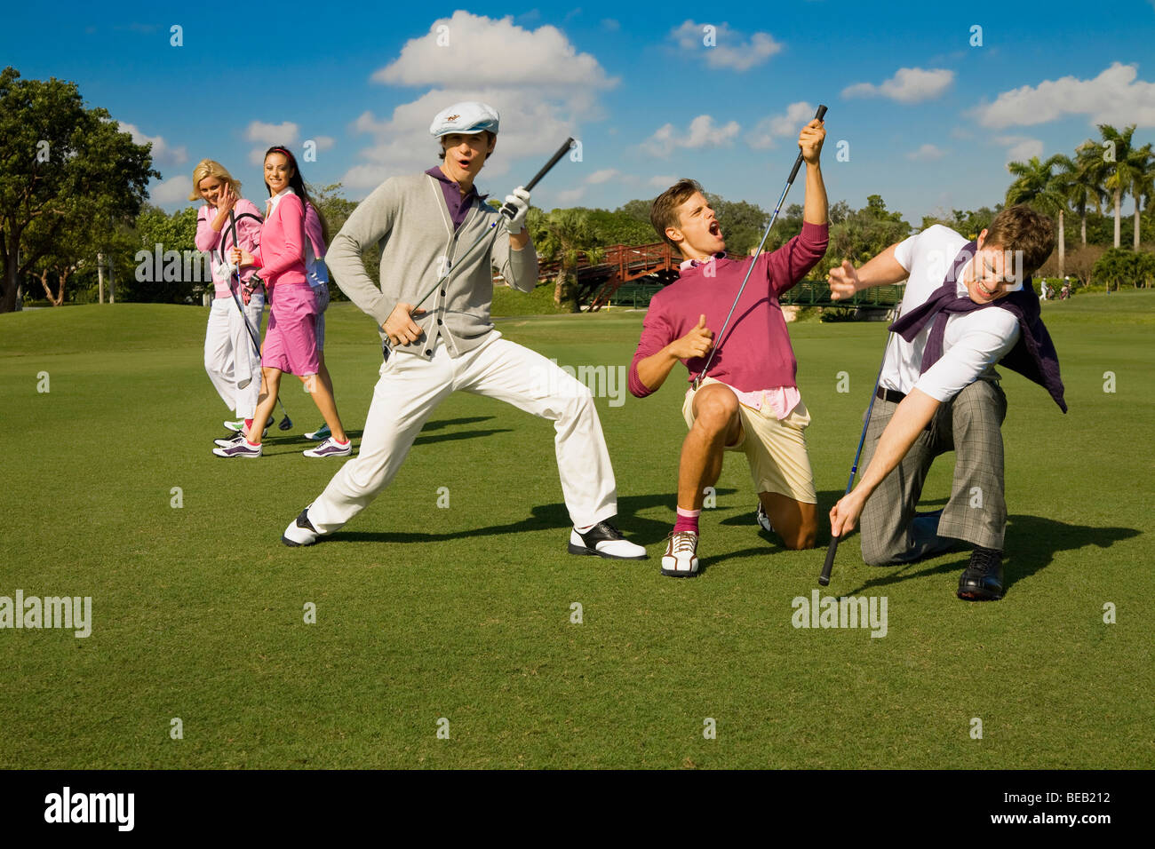 Five friends having fun in a golf course, Biltmore Golf Course, Coral ...