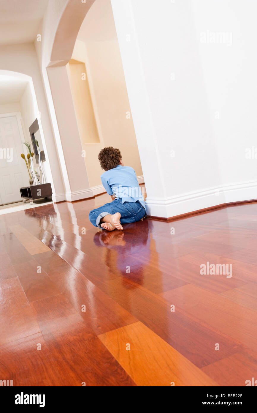 Boy hiding barefoot hi-res stock photography and images - Alamy