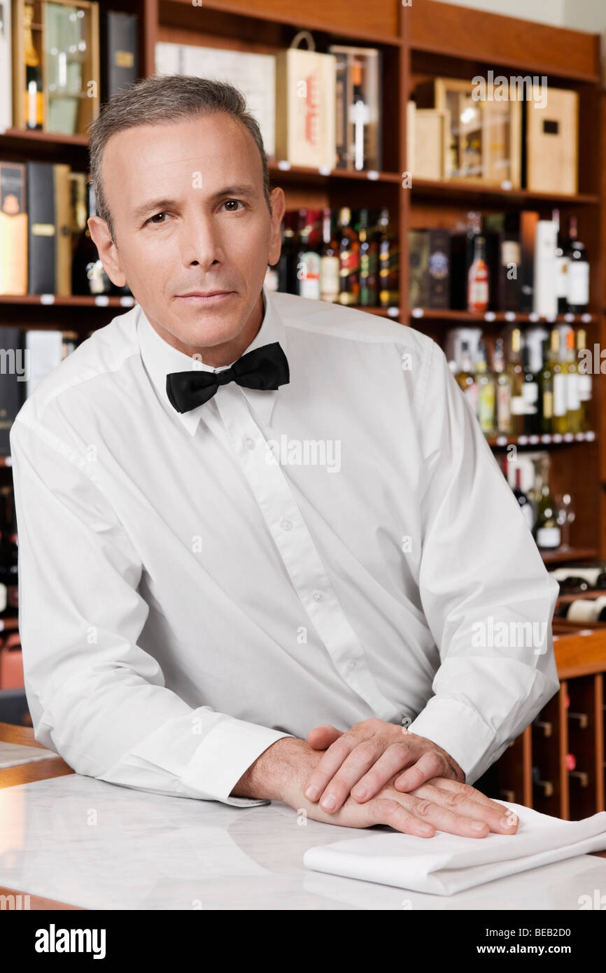 Man leaning against counter on hi-res stock photography and images - Alamy