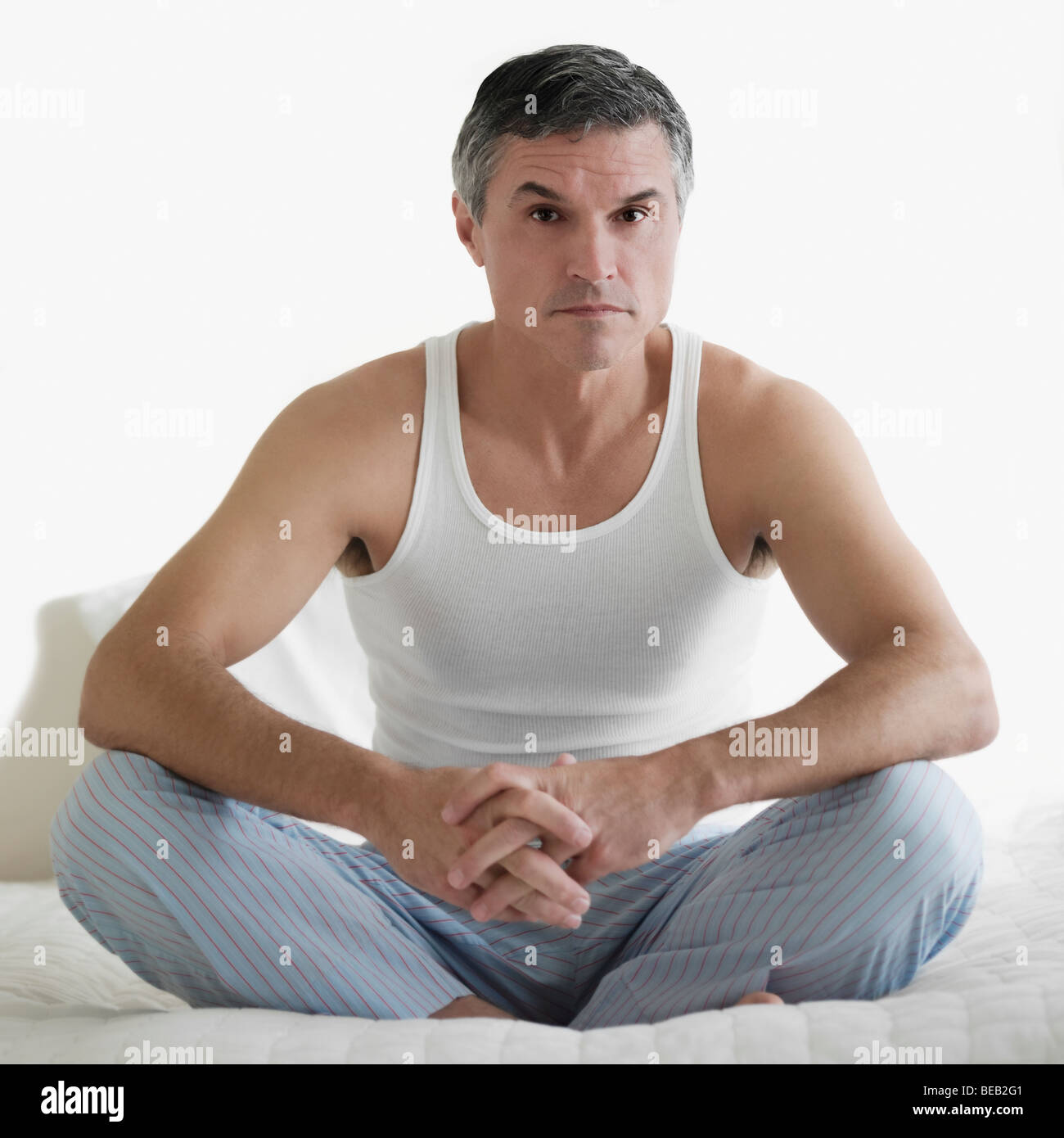 Man thinking on the bed Stock Photo - Alamy