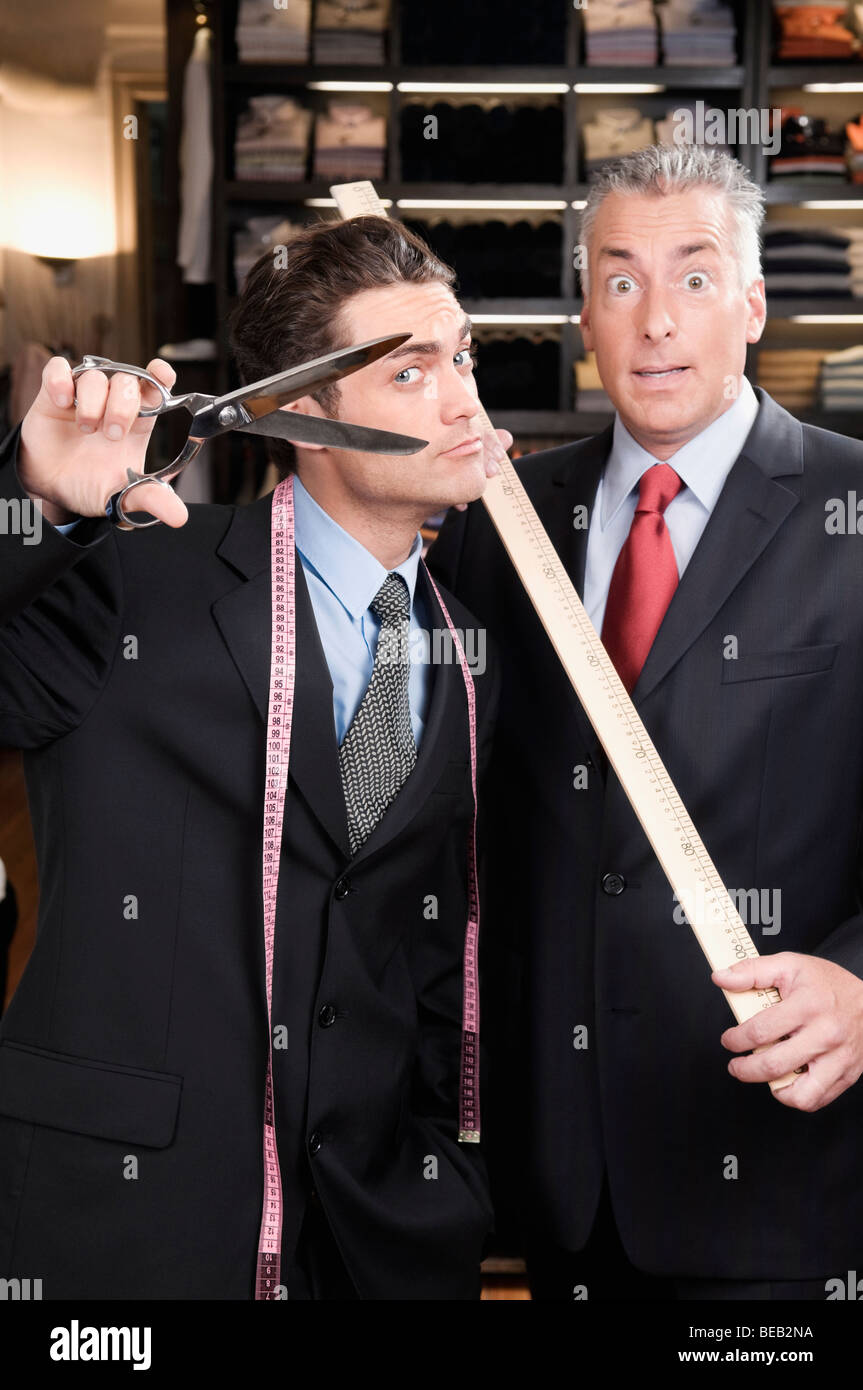 Tailor scissors tape measure suit hi-res stock photography and images ...